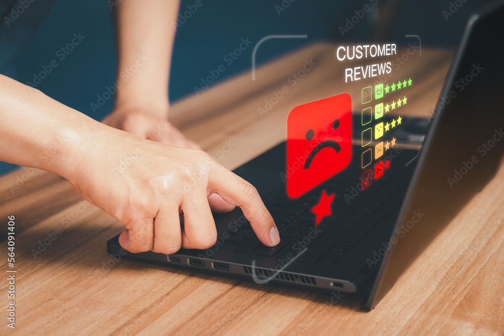 Unhappy man customer with sad emotion face on laptop. Bad review and ...