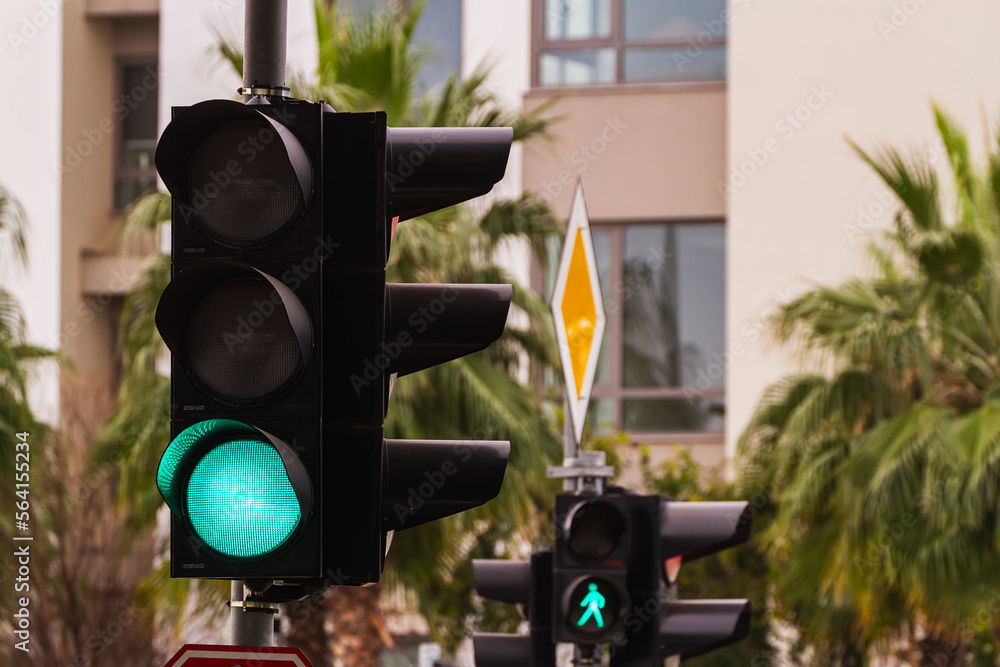 Traffic lights over urban intersection. Green light Stock Photo | Adobe ...