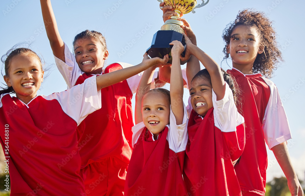 Soccer, team and trophy with kids in celebration together as a girl winner group for a sports ...