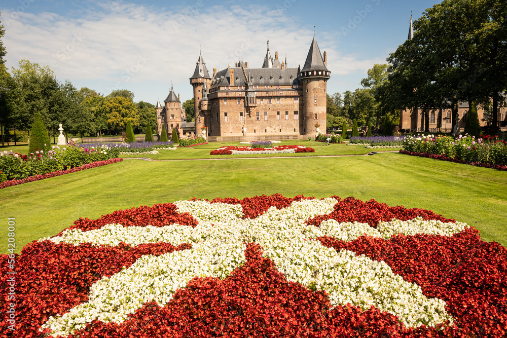 outside of Kasteel De Haar Dutch medieval castle with floral garden on ...