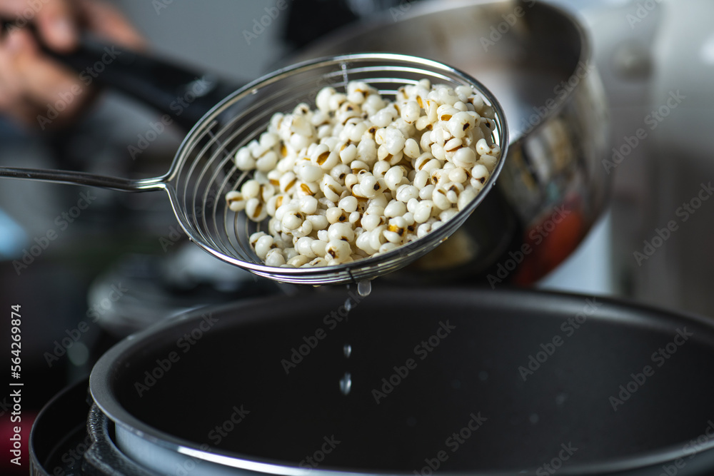 Hot Boiled Job’s Tears millet seed from boiler. White boiled Job’s ...