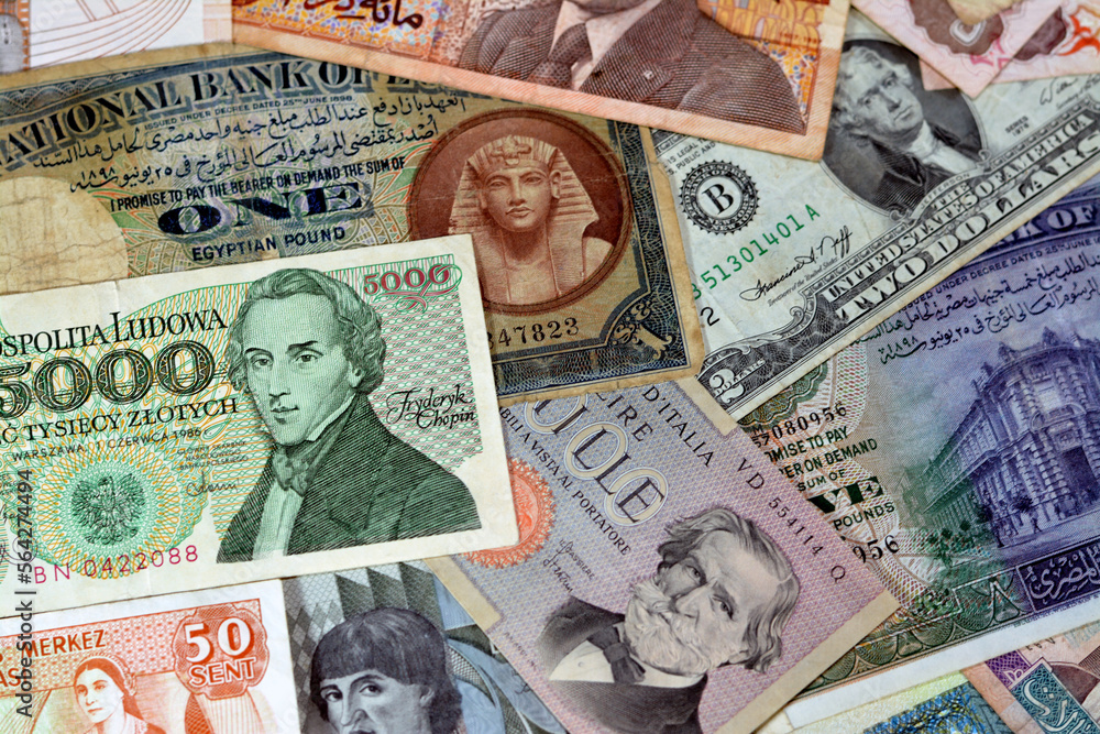 various old cash money banknotes from different countries of the world ...