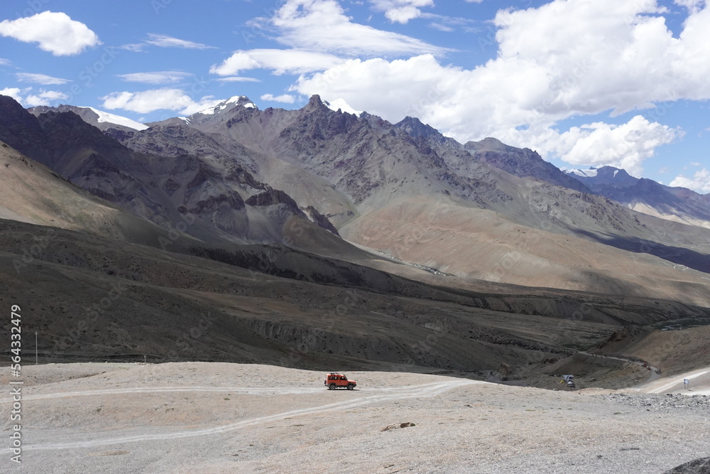 Ladakh, India - August 24th, 2022: Offroad vehicle goes on the mountain ...