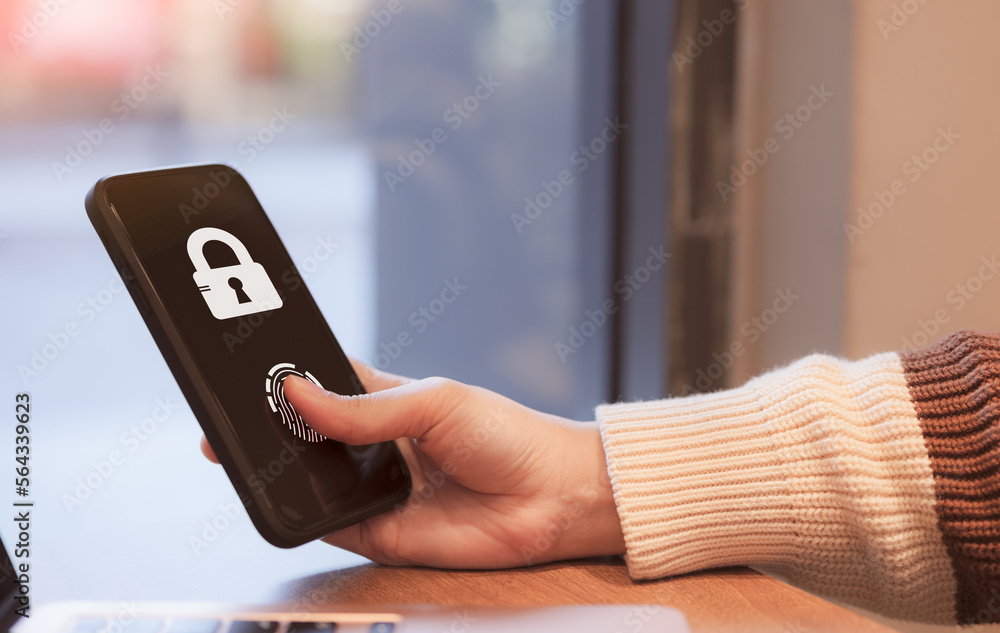 Cybersecurity concept. User log in to access smartphone. Biometric identification fingerprint ...