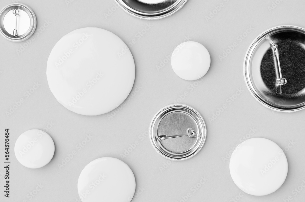 Multiple different sized badges on a grey background. Stock Photo ...