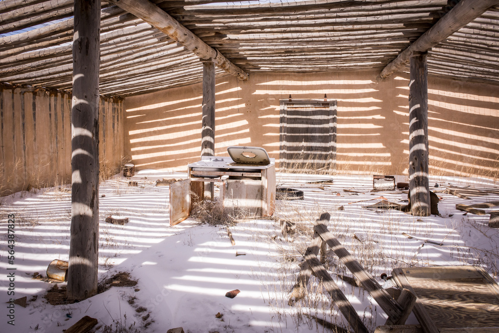 Interior of abandoned potato bunker/storage barn in winter. heavy beams ...
