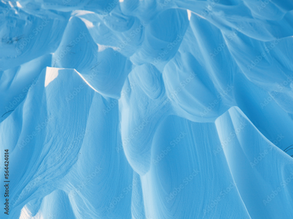 Snow texture. Wind sculpted patterns on snow surface. Wind in the ...