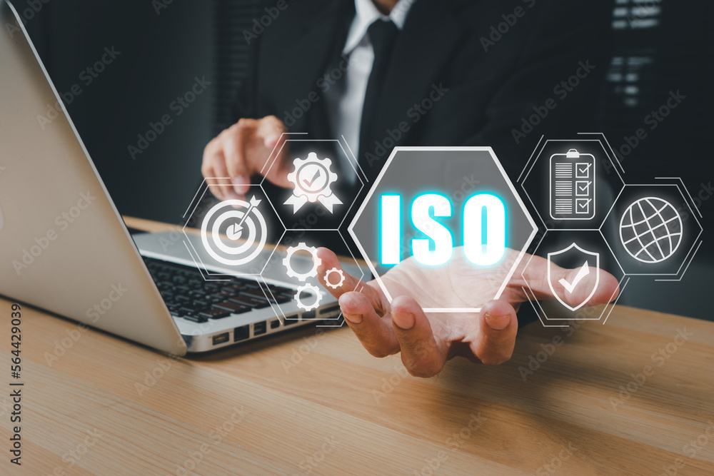ISO standards quality control concept, Person hand holding iso icon on ...