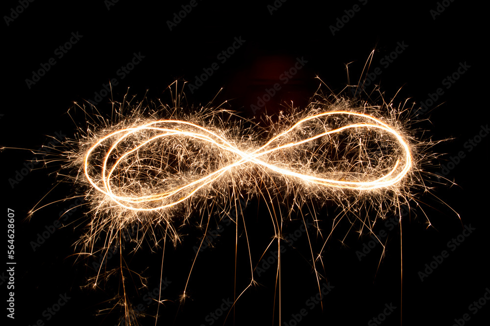 Different figures, letters or drawings created at night with flares ...