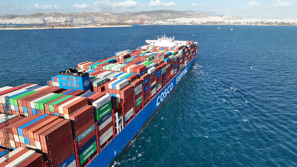 Foto de Aerial drone ultra wide photo of COSCO truck size container ...