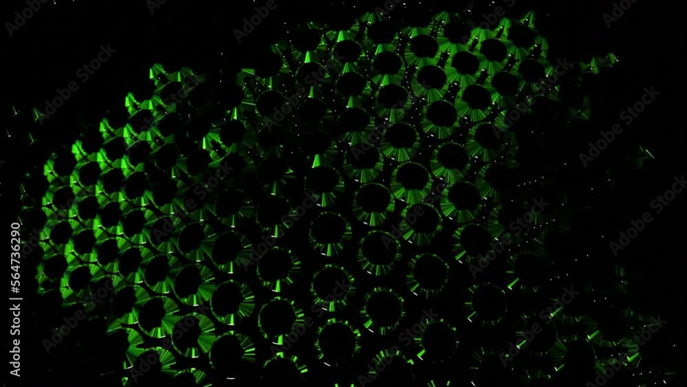 Black background with glass mesh. Design. Yellow and green backlighting ...