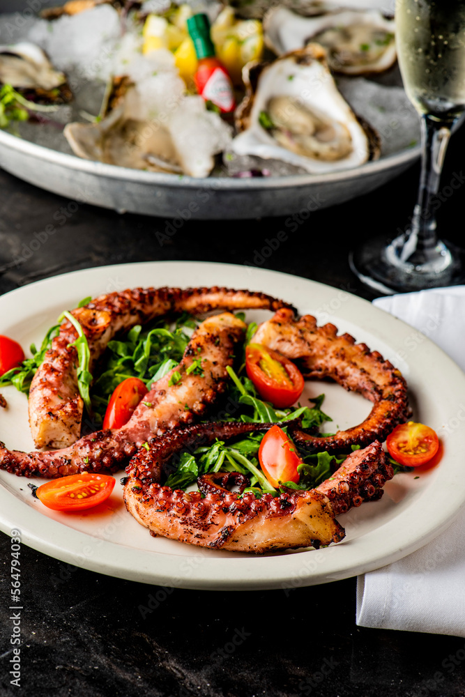 Grilled octopus. Prepared in traditional Italian style: fried in olive ...