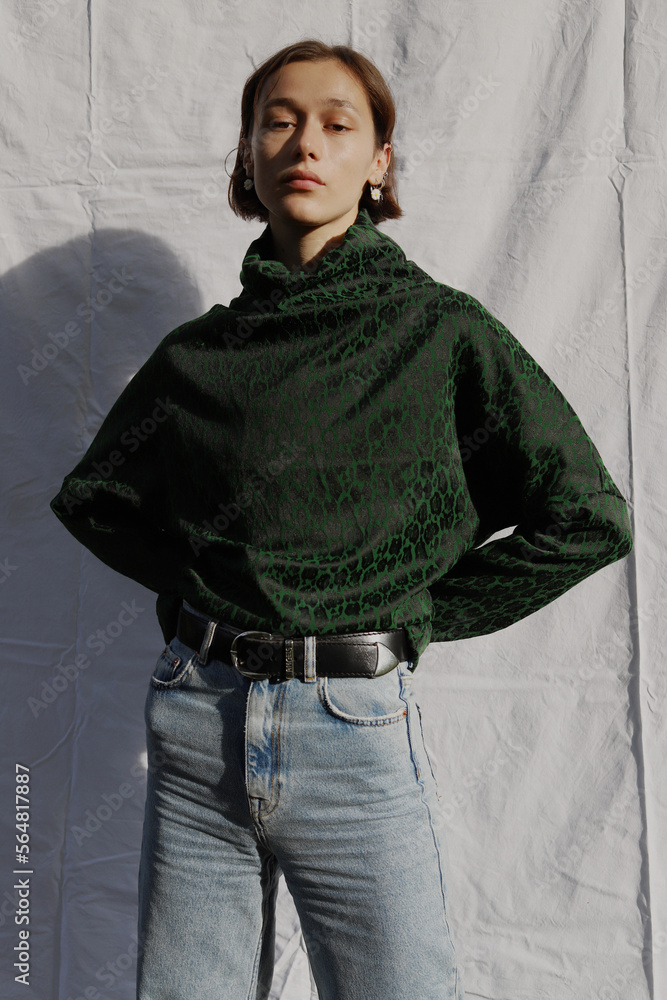 Young girl posing in front of white background in nature Stock Photo ...