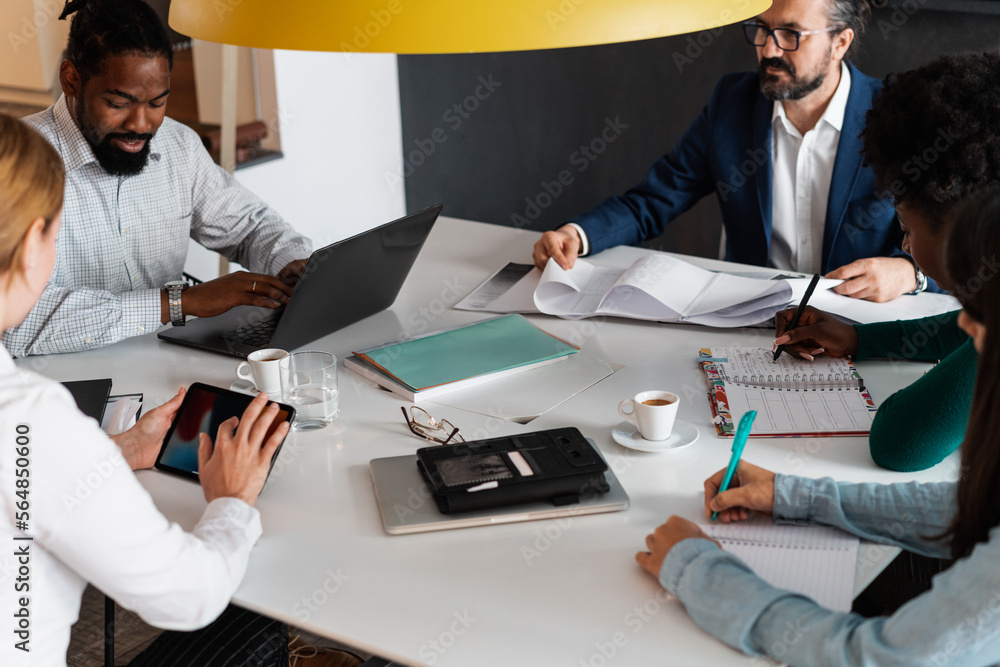 Team Working Together In The Office Stock Photo | Adobe Stock