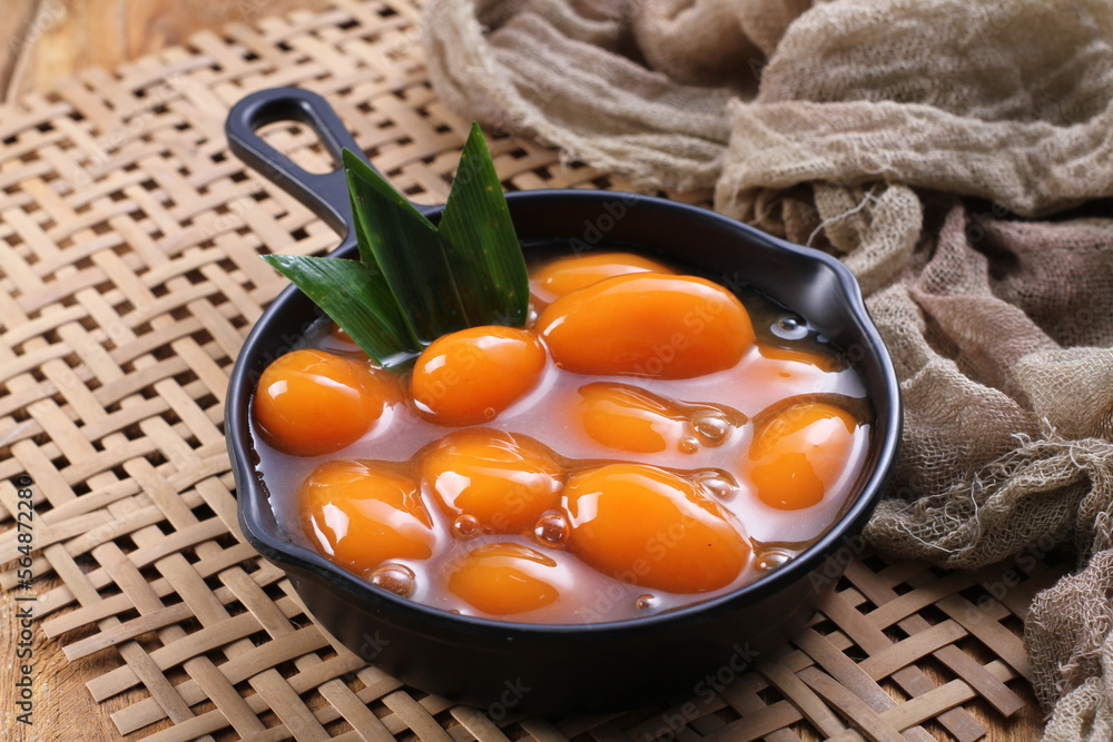 Kolak (or kolek) is a typical Indonesian dessert made from palm sugar ...