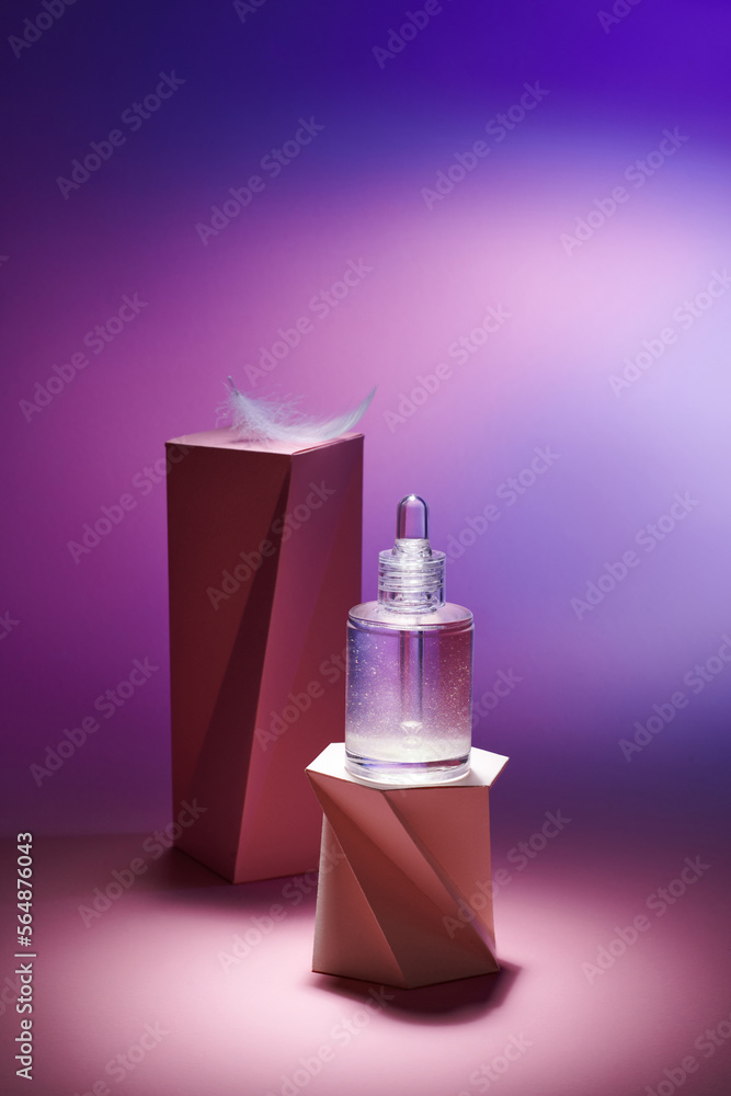 Essential oil pipette on a white round podium on a colored Stock Photo ...