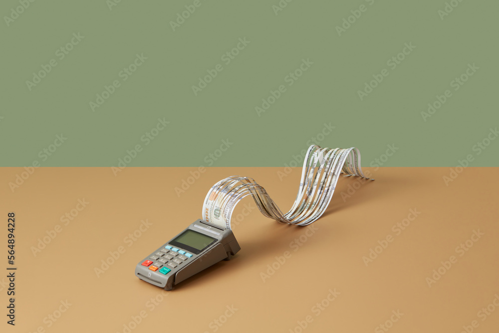 POS terminal printing dollar banknote receipt. Stock Photo | Adobe Stock