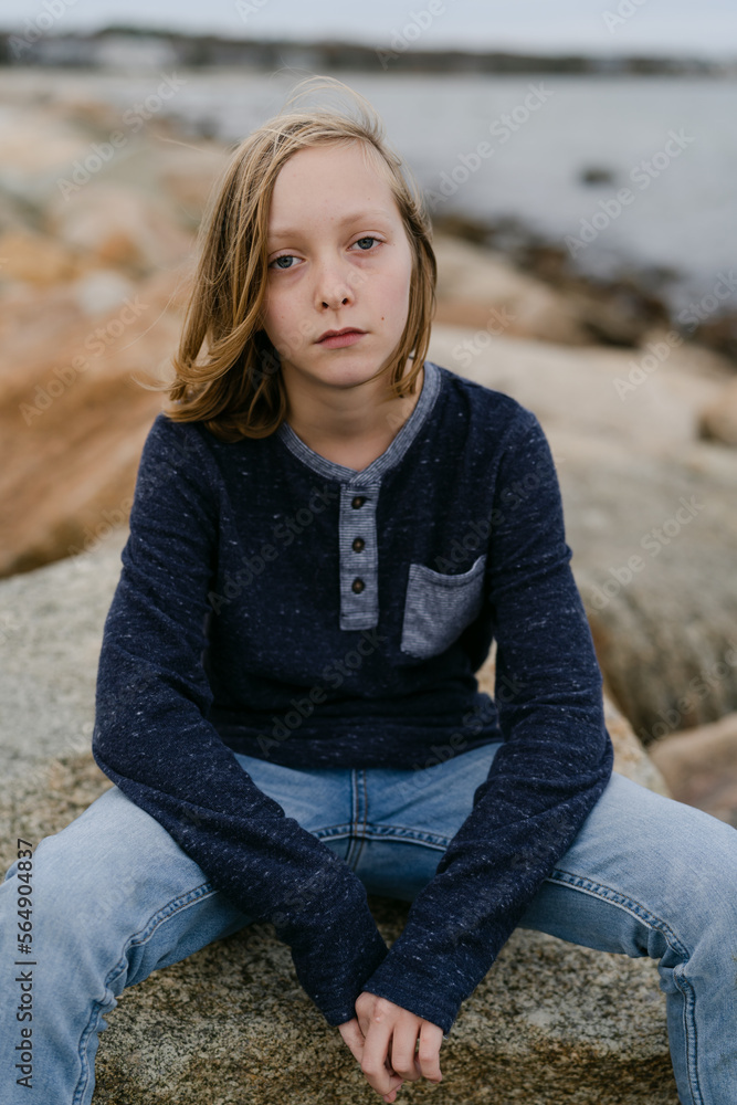 portrait of tween boy at the beach Stock Photo | Adobe Stock