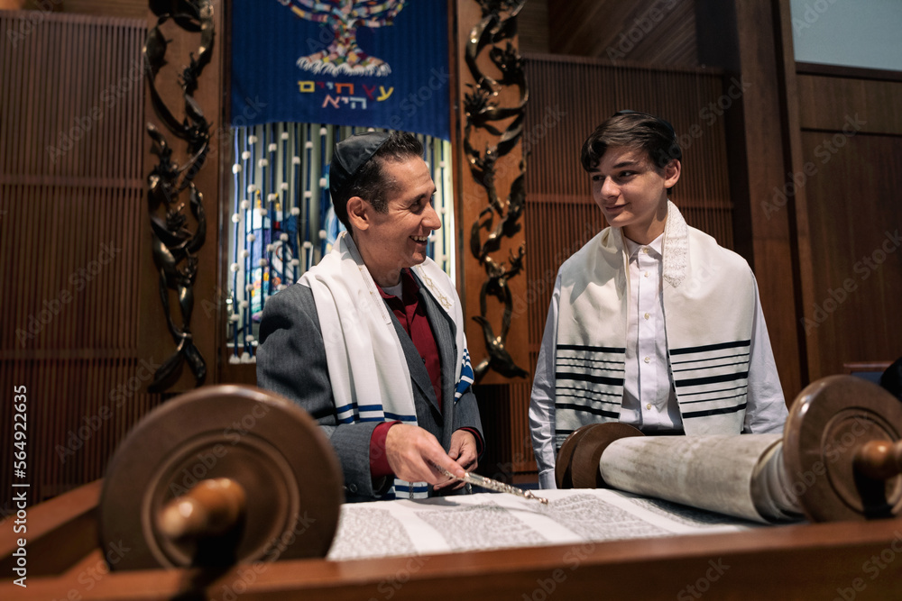 Synagogue: Rabbi Working With Male Teen On Torah Portion Stock Photo ...