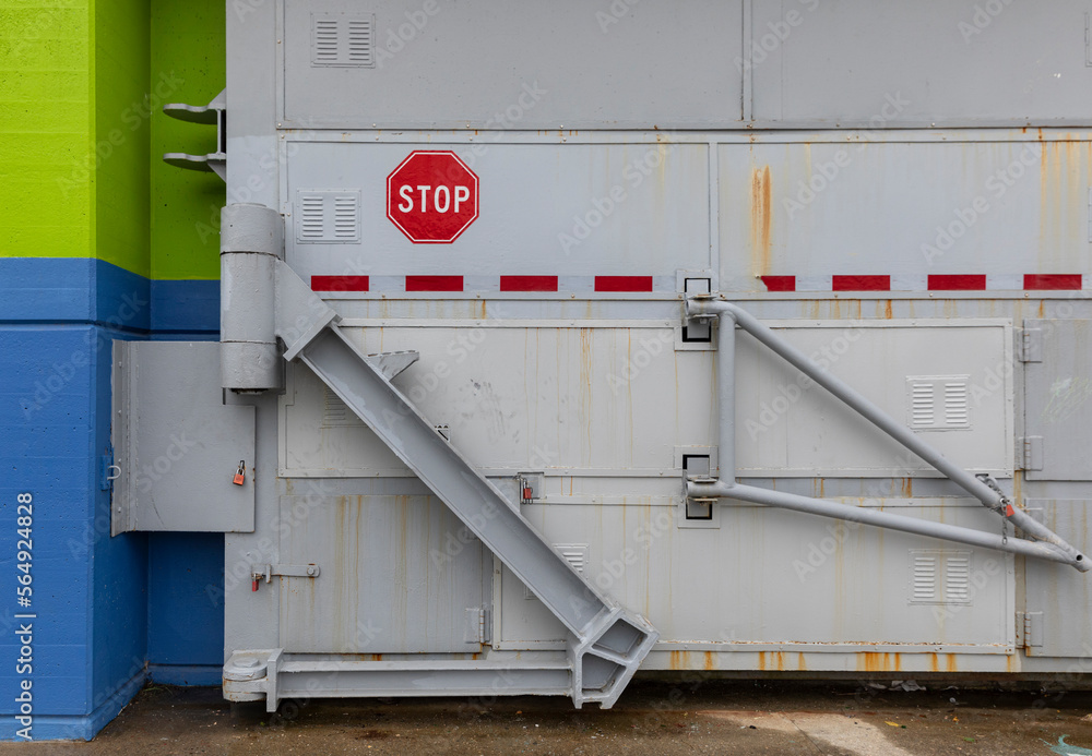 Flood gate Urban Street Wall with Stop sign Stock Photo | Adobe Stock