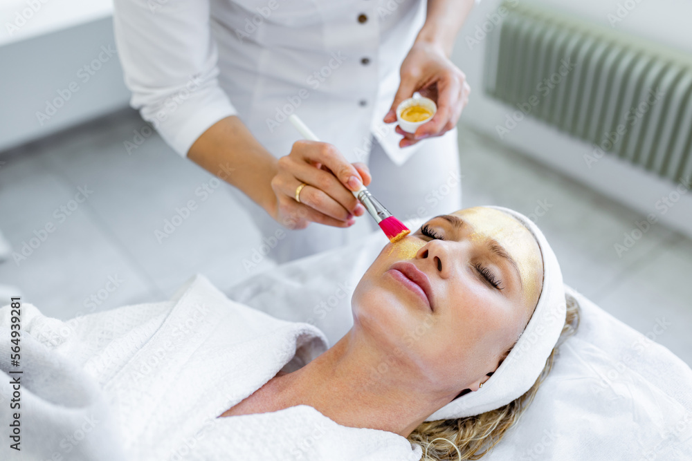 Beautiful woman relaxing in a beauty spa hotel - Client having a beauty ...