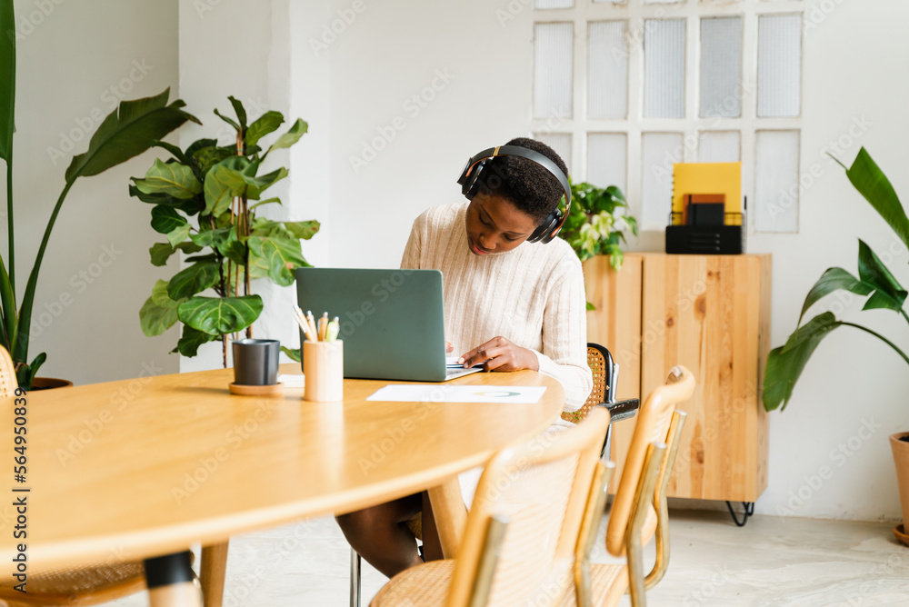 Female Office Worker In Modern Workspace Stock Photo | Adobe Stock