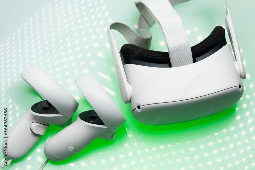 White new generation VR headset isolated on white background with green ...