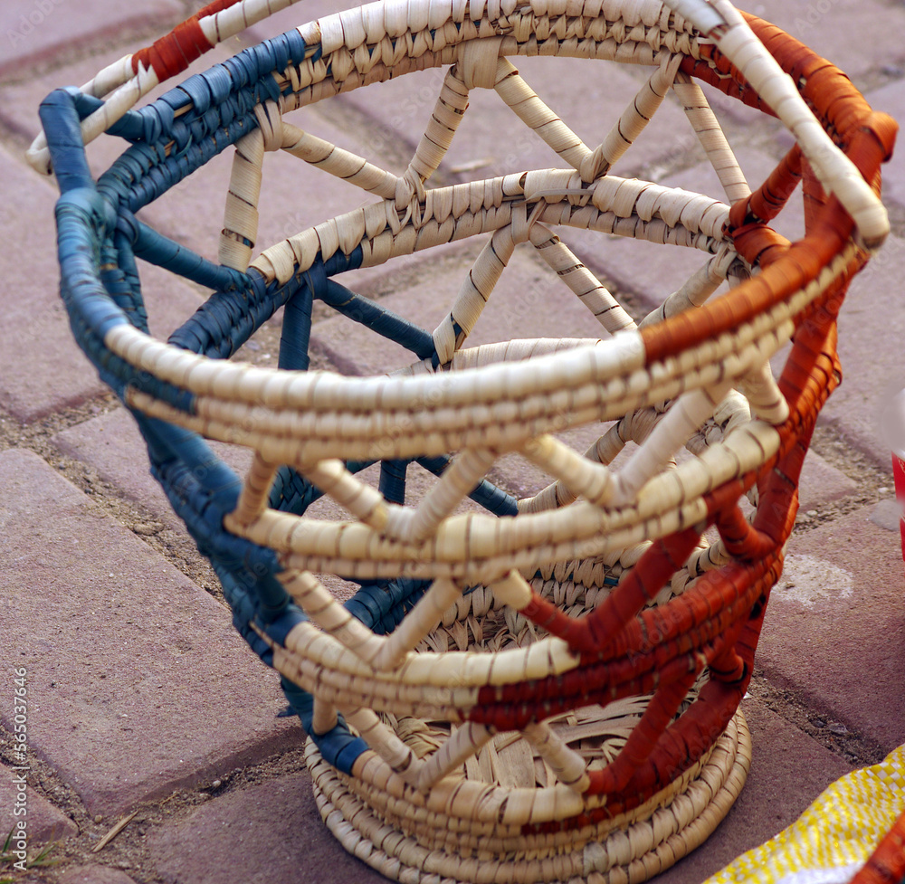 beautiful tribal basket is handwoven in Pakistan, using traditional ...