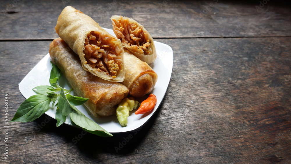 Lumpia or lunpia, a traditional snack from Semarang, Central Java ...