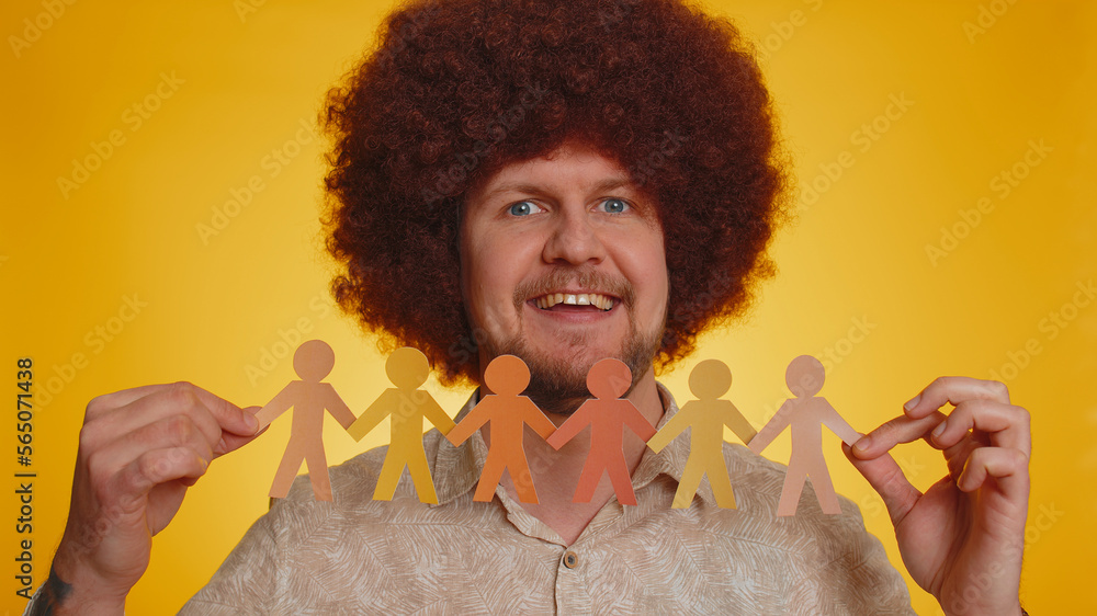 Bearded man showing multiracial different skin color human shape cut ...