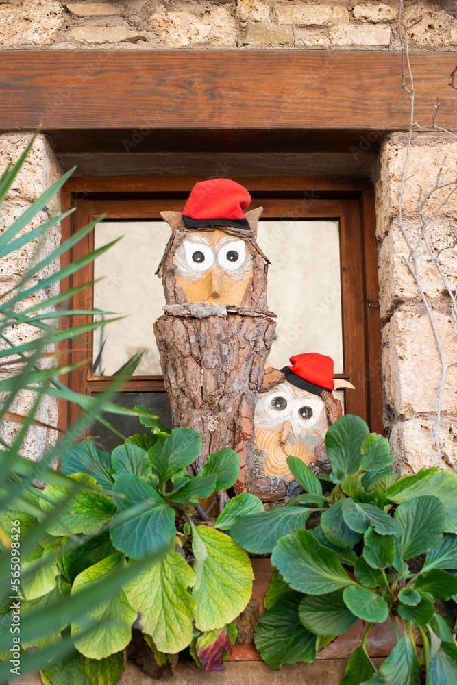 Window of rustic house decorated with Christmas character in Catalan ...