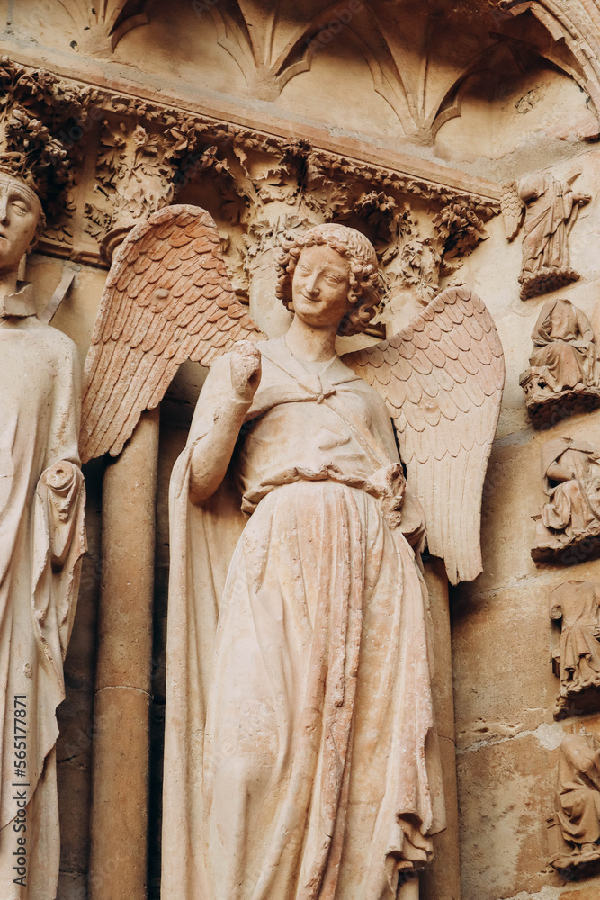 The Smiling Angel, also known as the Smile of Reims, a stone sculpture ...