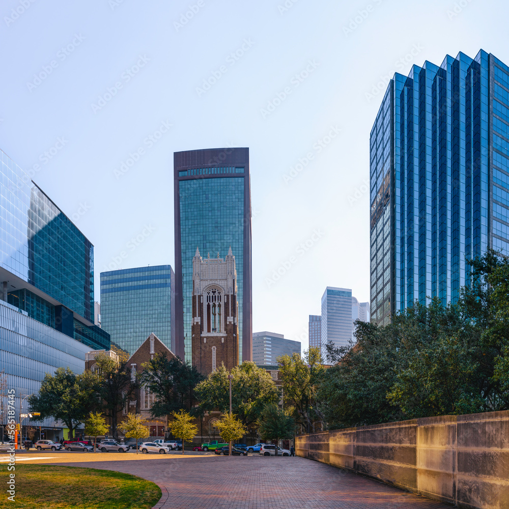Dallas downtown skyline cityscape over the footpath in the city park ...