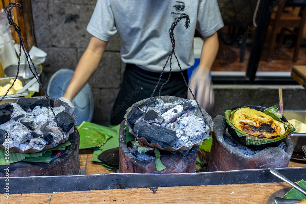 Popular Traditional Filipino Street Food bibingka Stock Photo | Adobe Stock