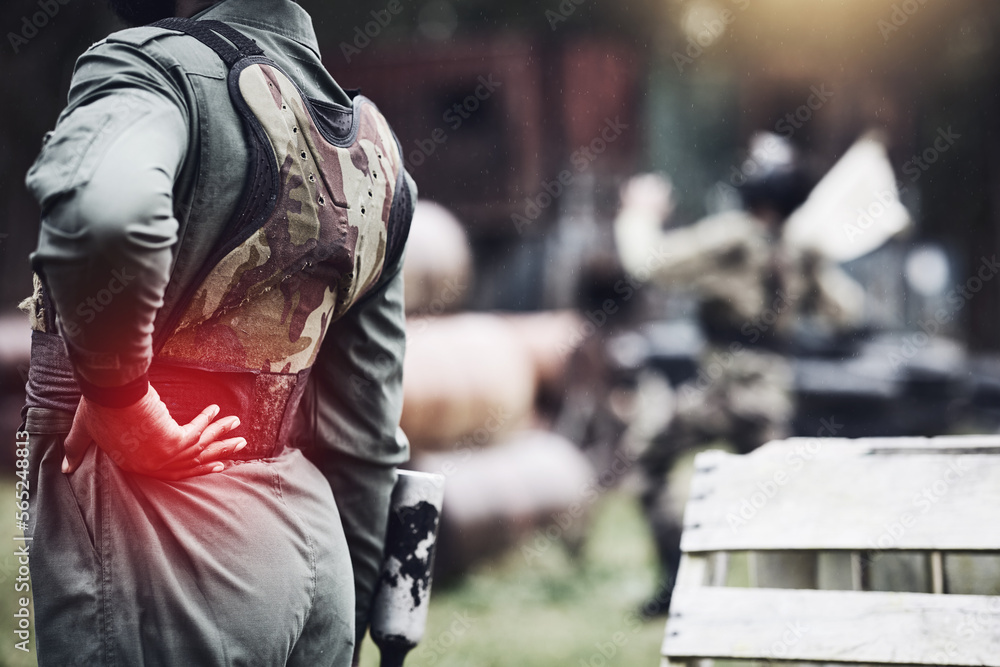 Pain, inflammation and person at paint ball with a back injury, medical ...