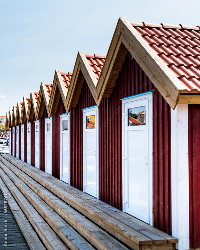 Scandinavian architecture example with a row of red pitched ...