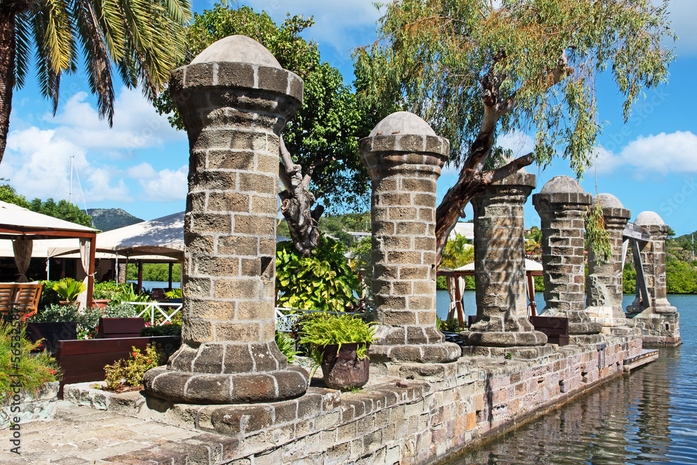 The sail loft pillars, located in Nelson's Dockyard on the island of ...