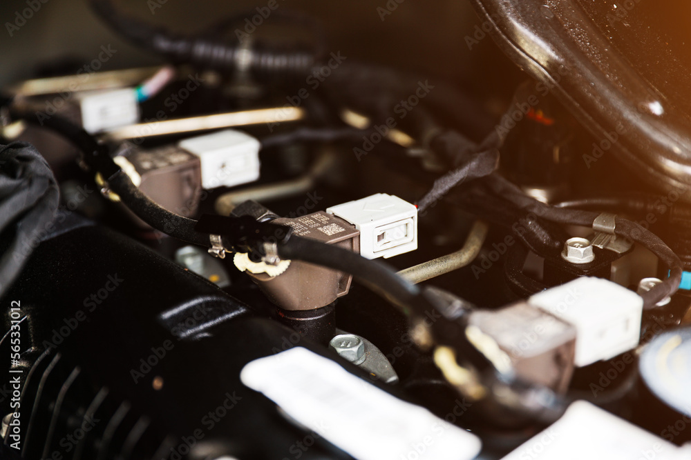 spark plug. Detail photo of car engine under the hood. oil gauge Stock ...