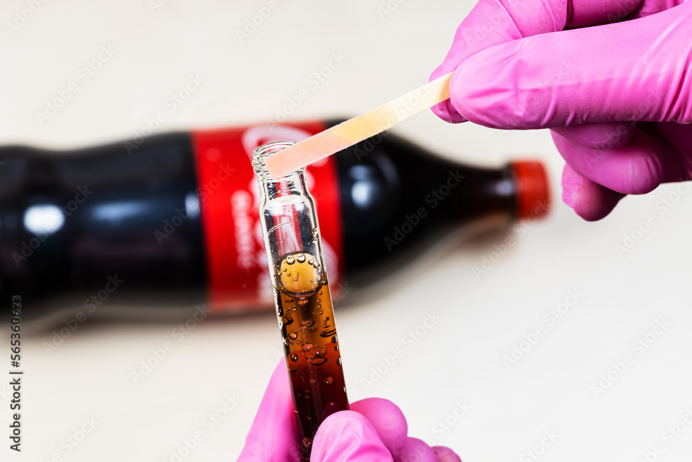 Moscow, Russia - January 12, 2023: measurement of pH level of Coca Cola ...