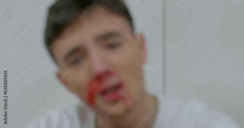 Camera movement, soft focus guy sings a song on the floor in the ...