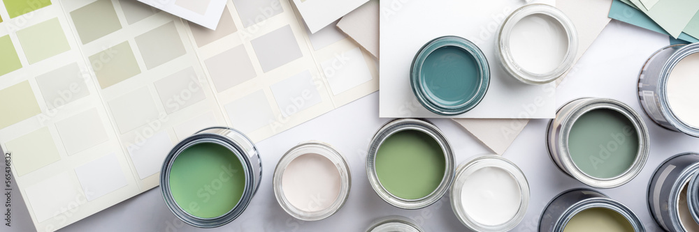 Tiny sample paint cans during house renovation, process of choosing ...