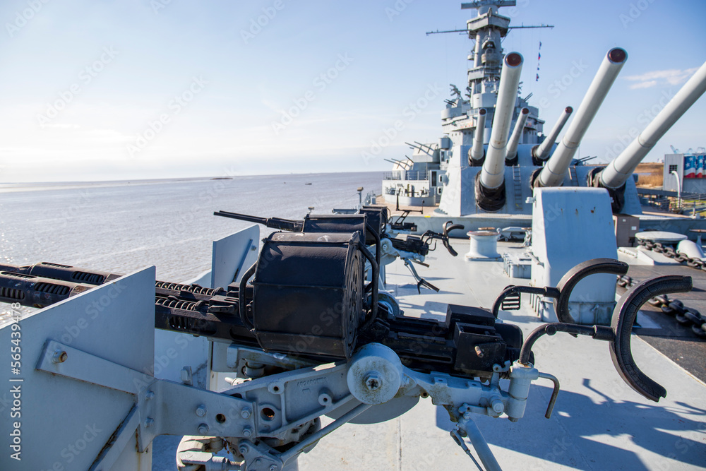 Along the bow of the USS Alabama with black anchor chains, 20 MM AA ...