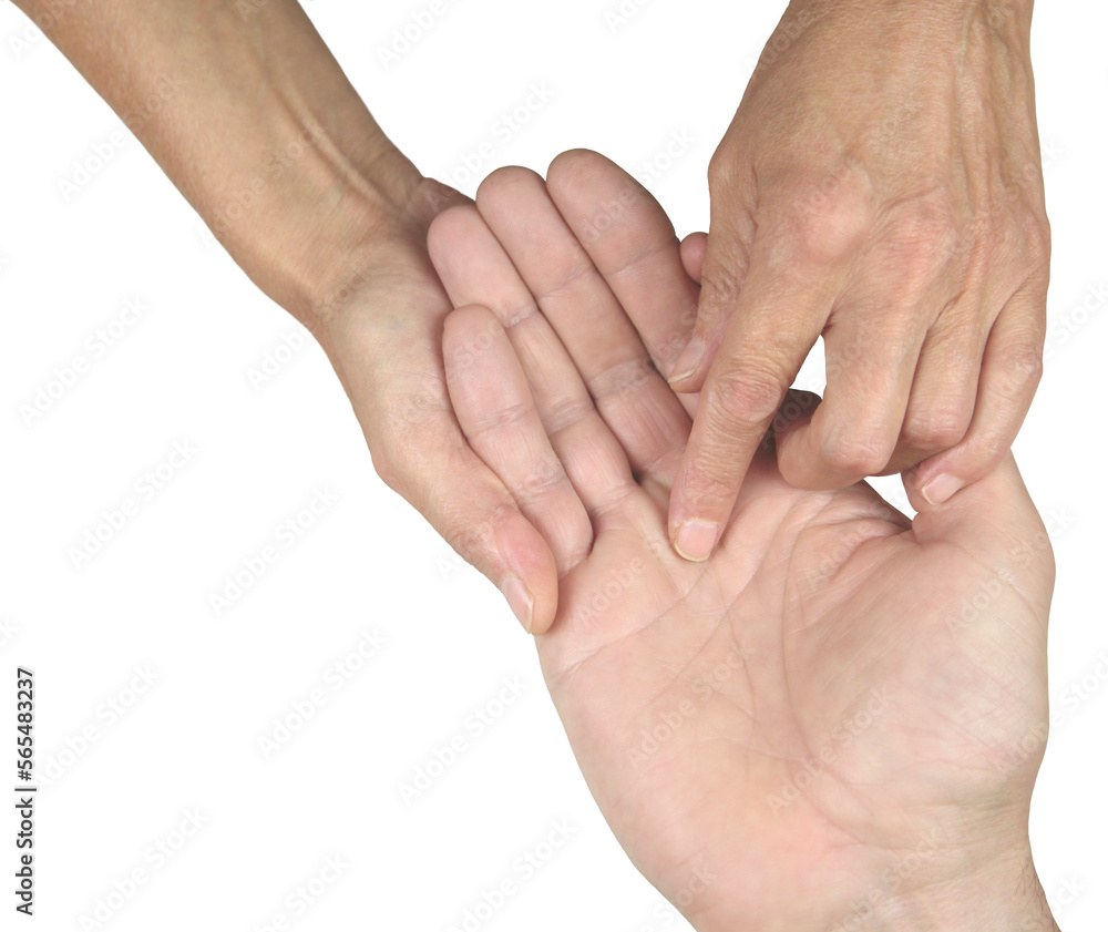 Female Palm Reader holding a man's open palm hand pointing to the Heart ...
