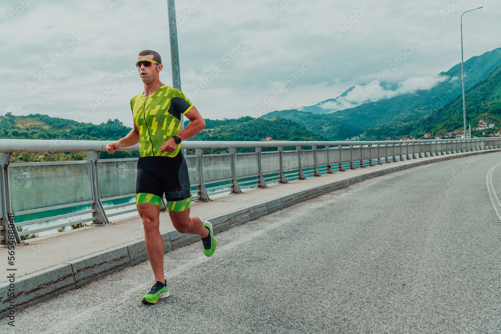 An athlete running a marathon and preparing for his competition. Photo ...
