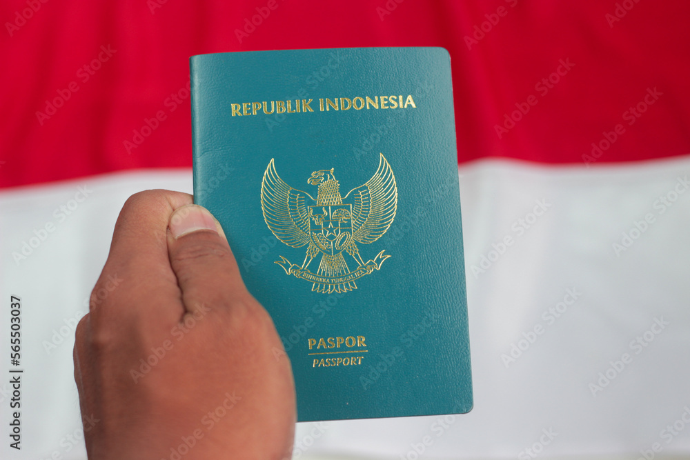 Indonesia passport on the Indonesian flag ,An Indonesian passport is a ...