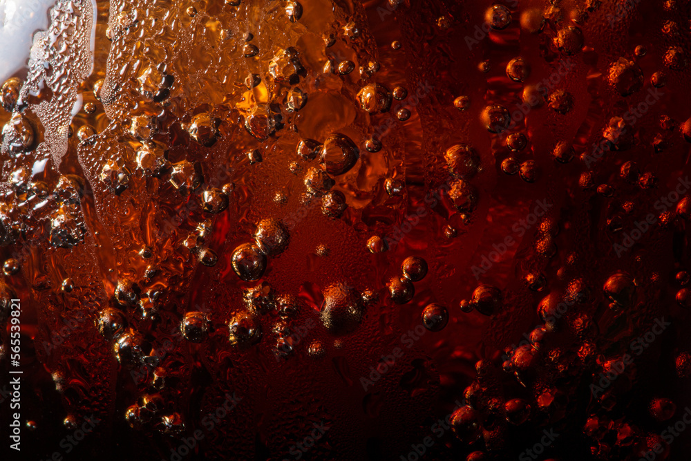 Poster macro cola drink texture,macro soft drink texture,Close up view of ice cubes in dark cola ...