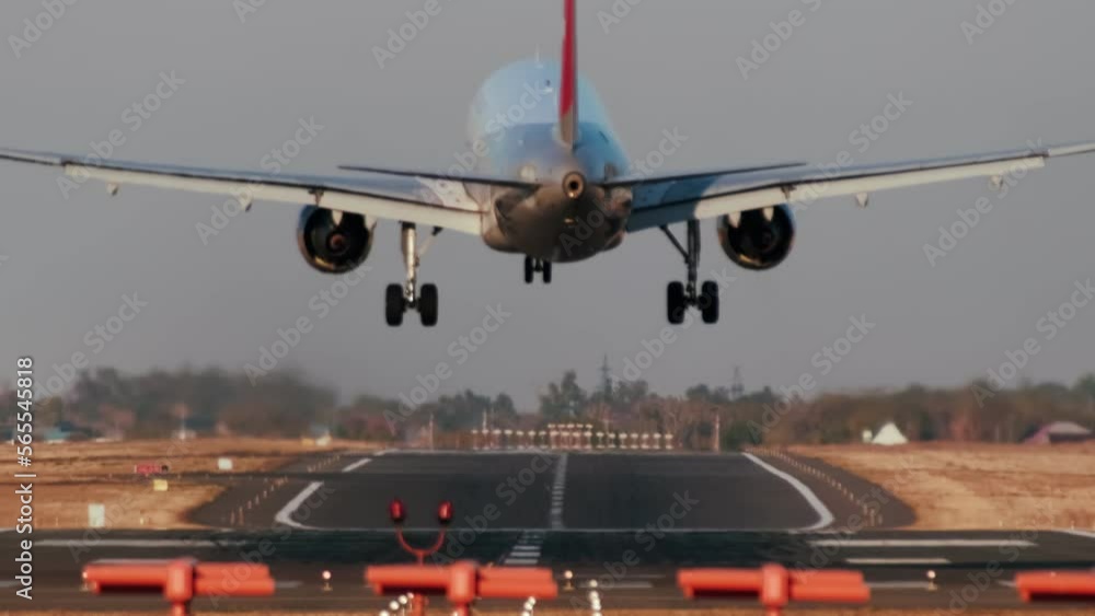 Passenger aircraft landing Close up. Passenger airplane landing towards ...