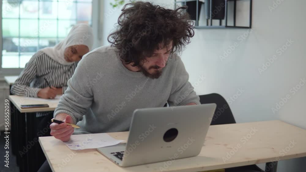 Student using formula math sheet to cheat on test. Hand of university ...