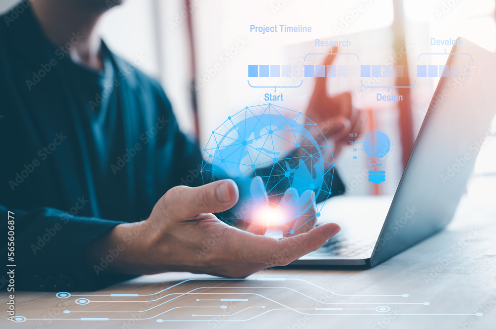 strat up business planning concept, man holding virtual glob with ...
