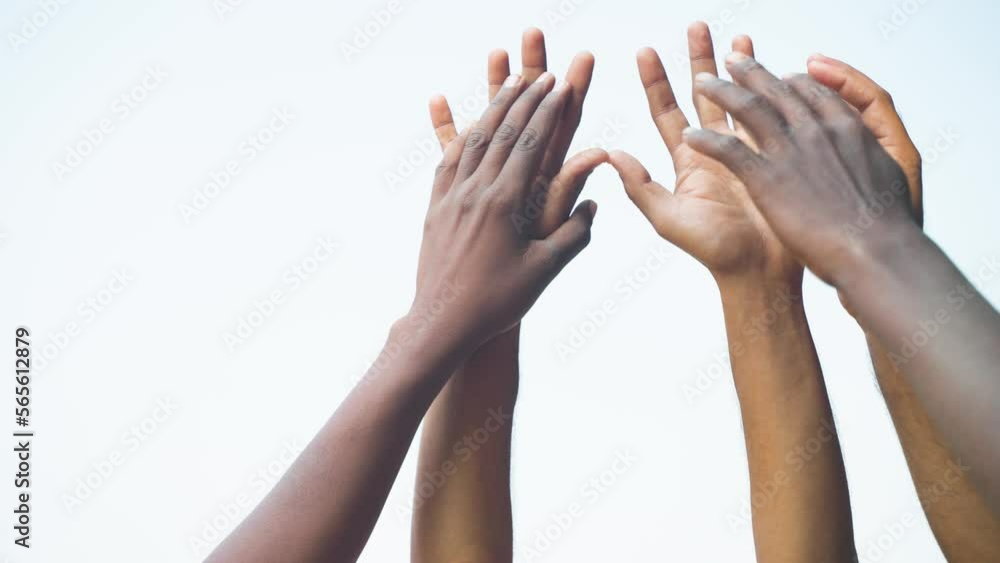 Close up shot group of hands joining other hand during protest ...